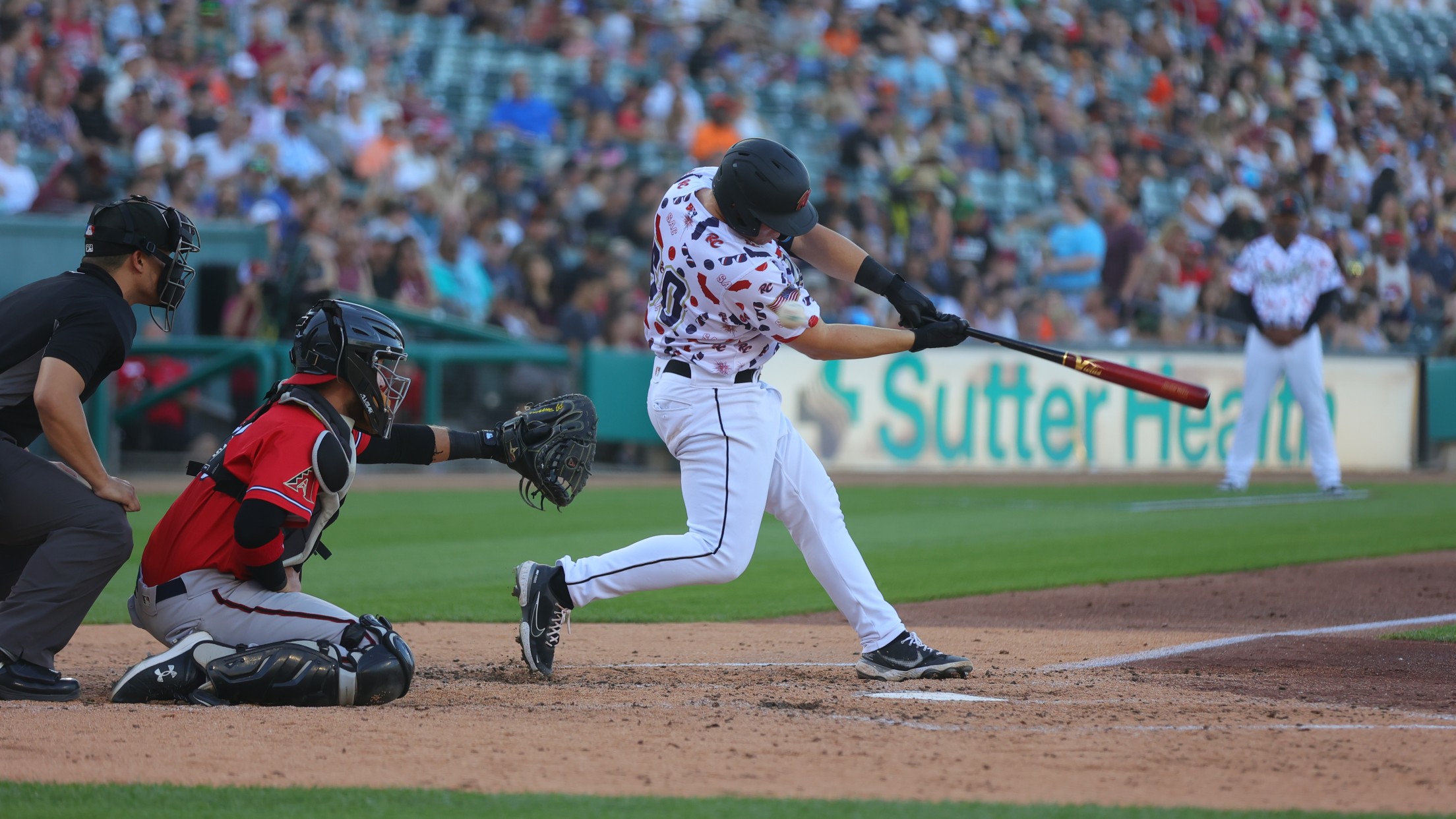 Ninth-Inning Rally Spurs River Cats to Independence Day Victory | MiLB.com