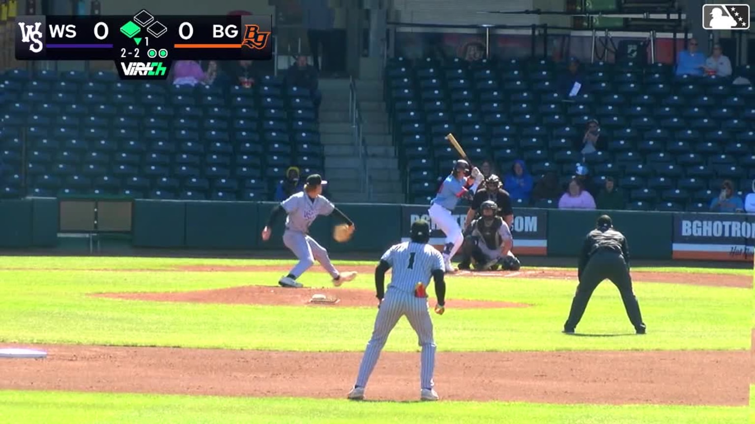 Nathan Flewelling singles on a sharp line drive to center fielder ...