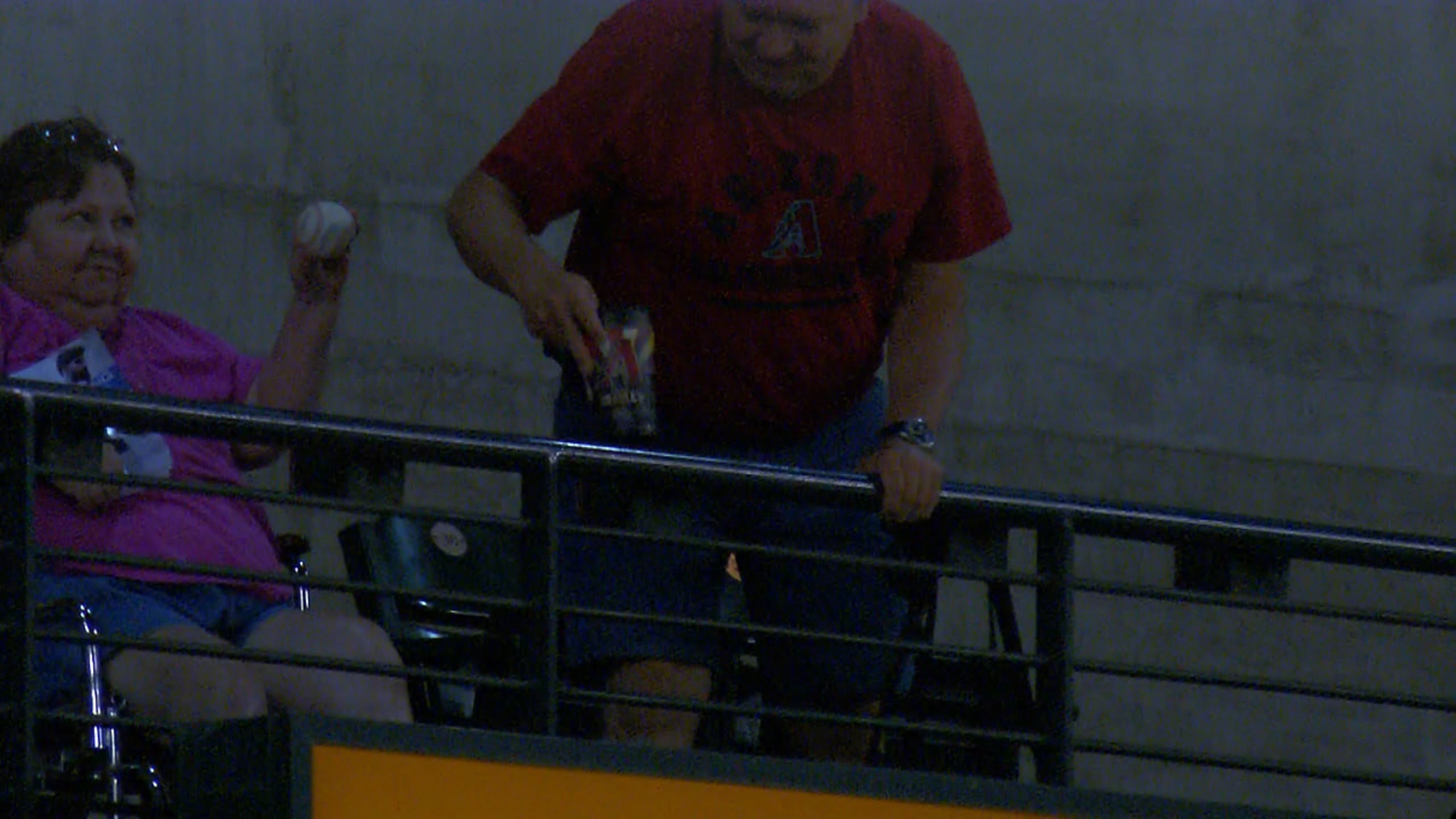 Fan in wheelchair makes grab