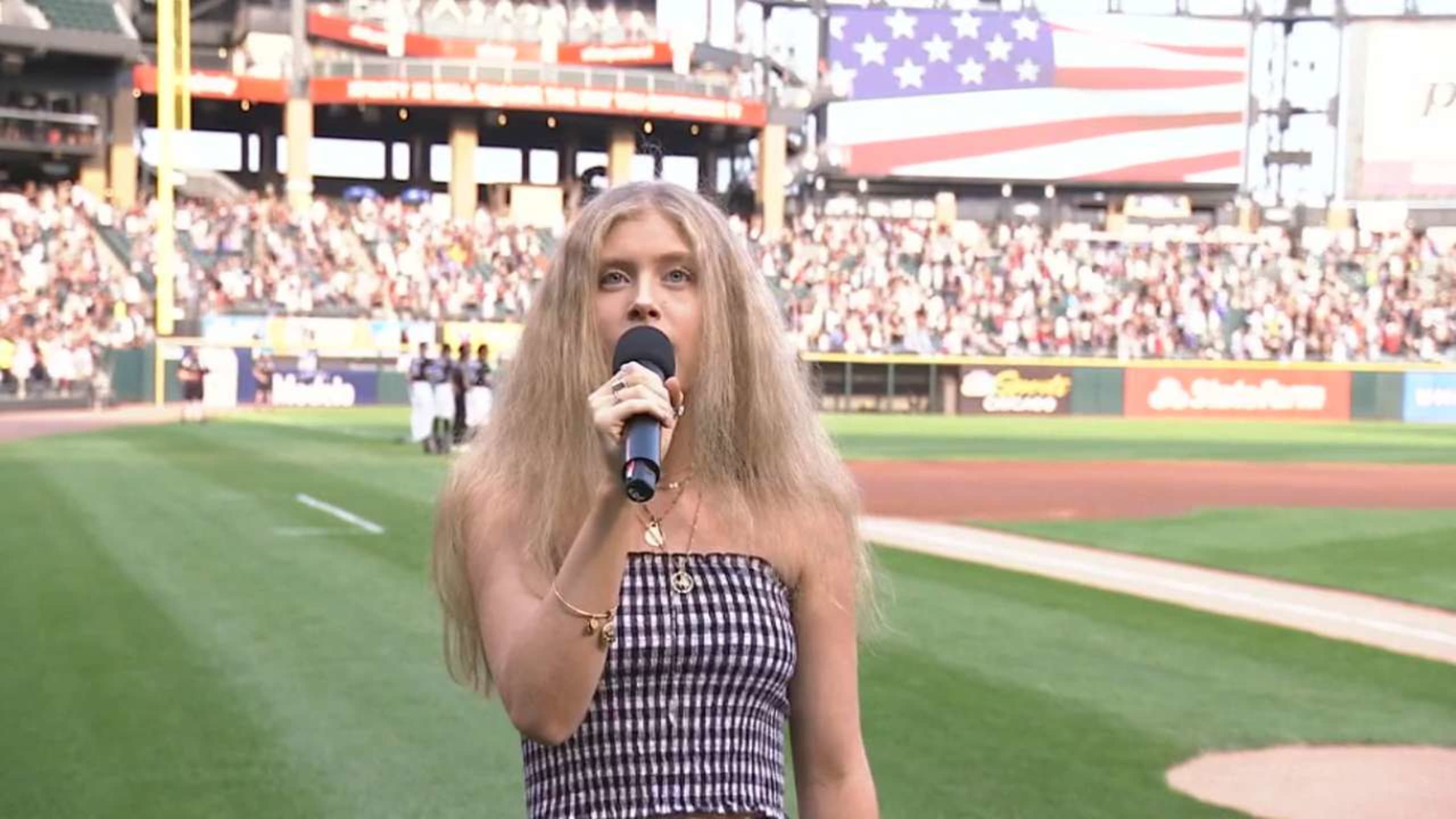 Lila Thome sings national anthem