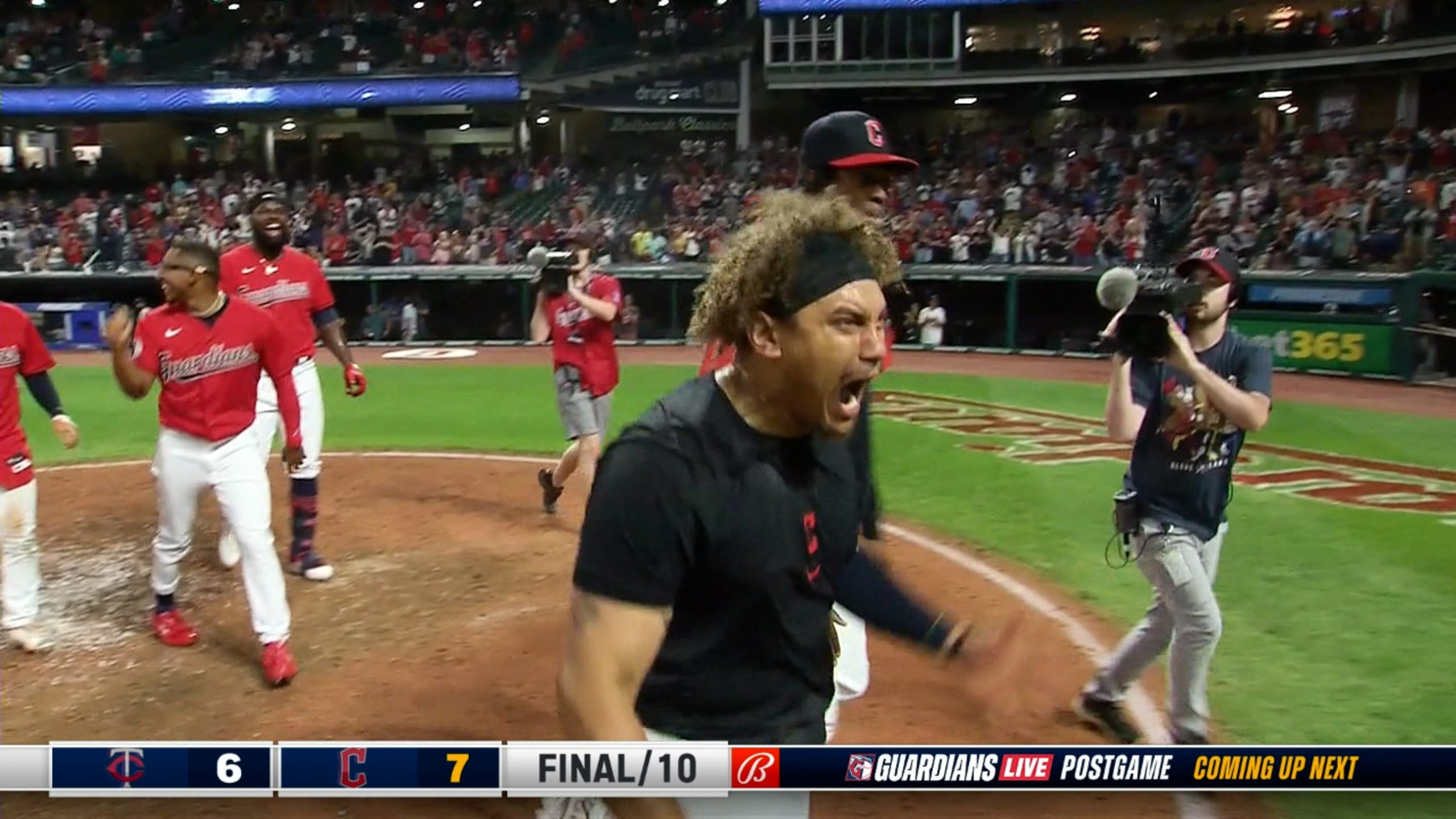 Josh Naylor celebrates walk-off