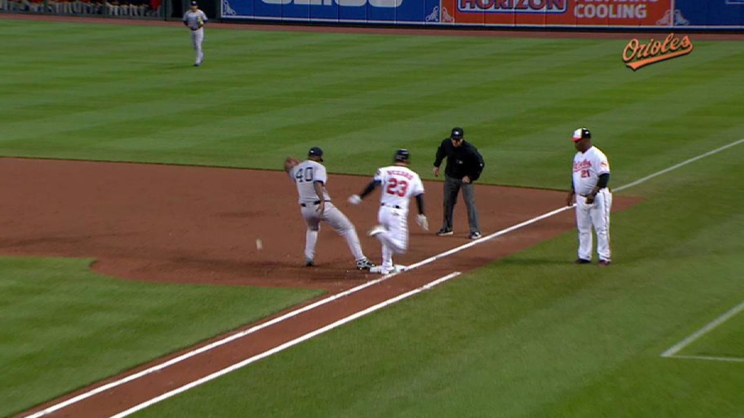 Joey Rickard reaches on a missed catch error by pitcher Luis Severino ...