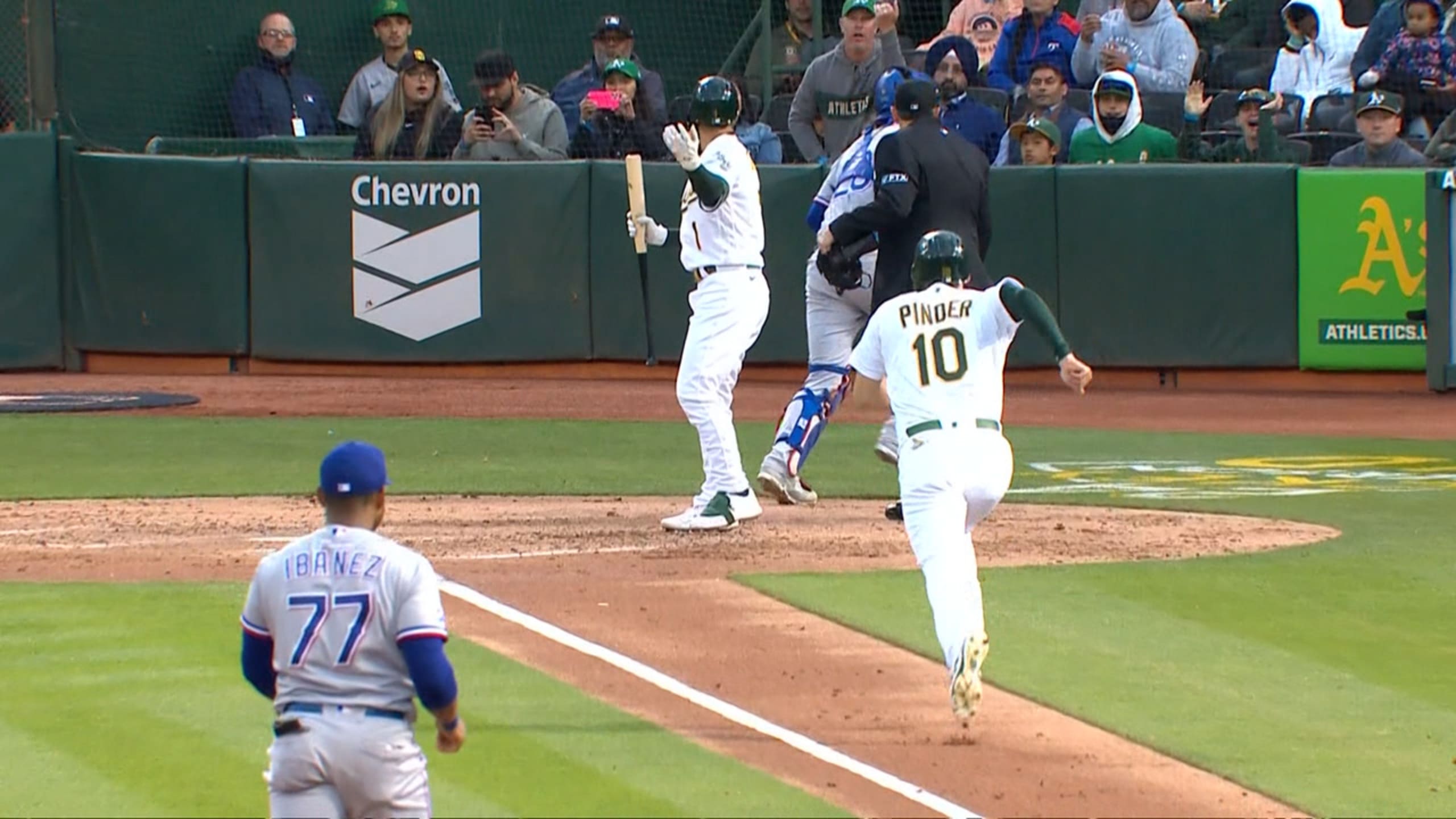 Chad Pinder scores on wild pitch