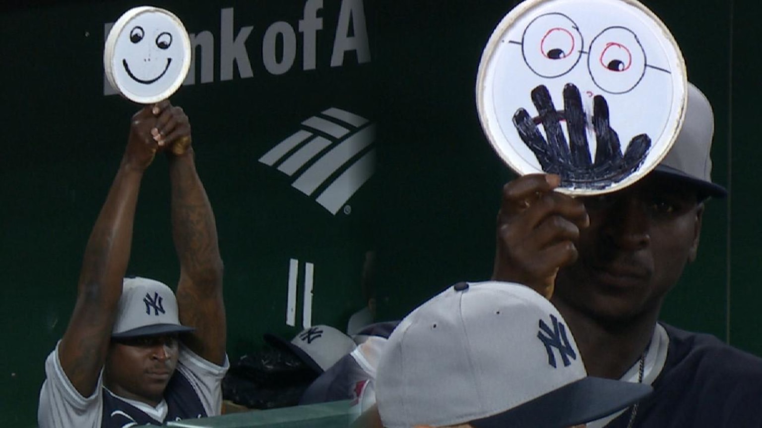 Didi holds up faces during game | 08/25/2018 | MLB.com