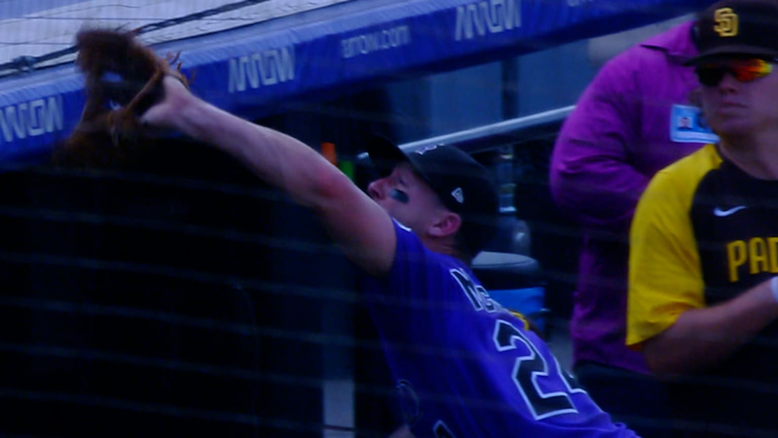 Ryan McMahon reaches over railing to record the out | 18/08/2021 | Los ...