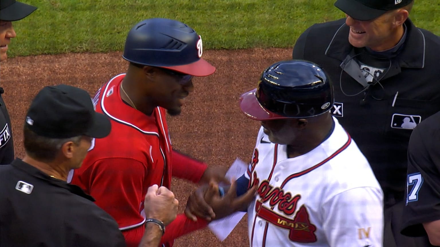 Eric Young Sr. and Jr. exchange lineup cards | 04/12/2022 | Washington ...