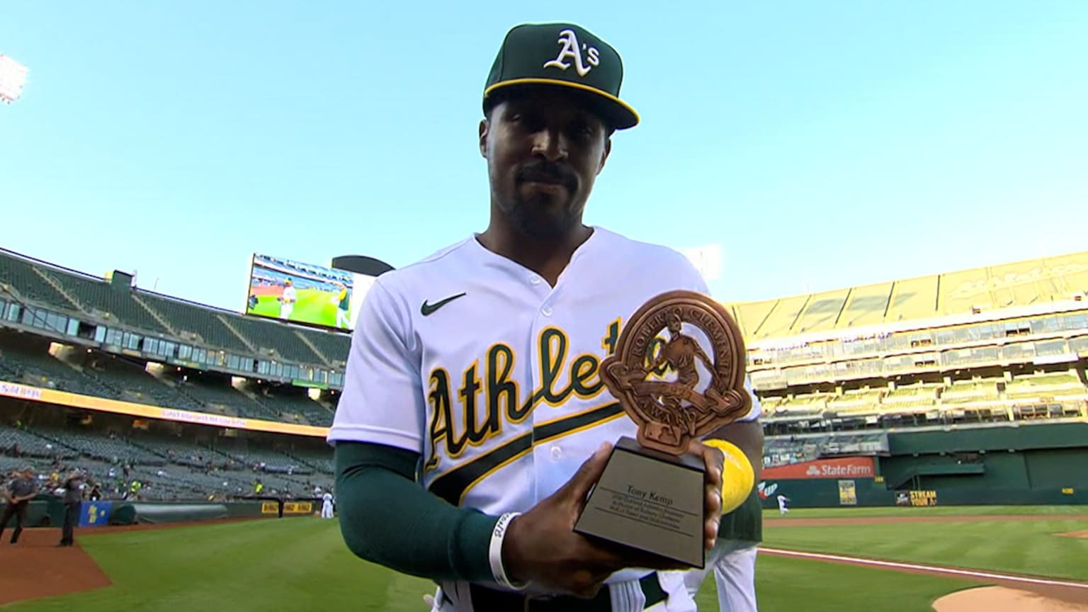 Tony Kemp receives Roberto Clemente nominee trophy | 09/20/2021 | Athletics
