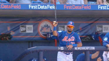 man catching baseball bat