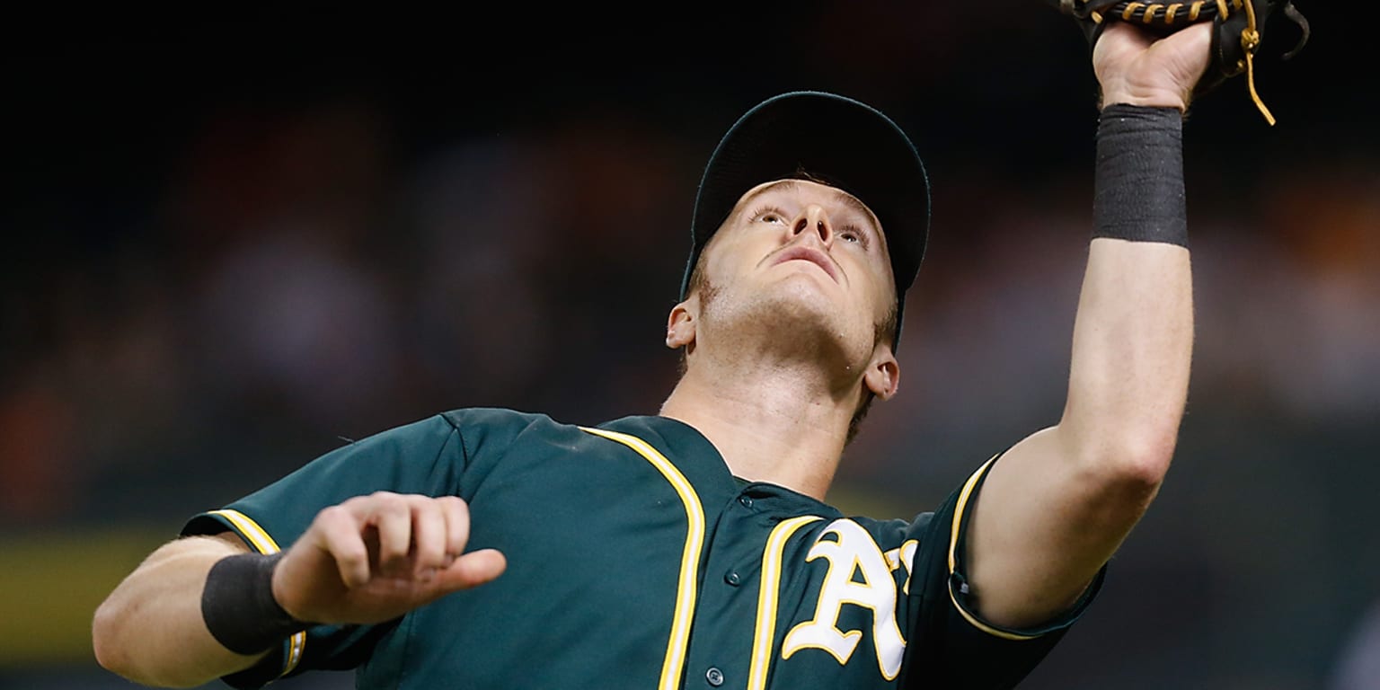 A's Mark Canha makes debut in center field