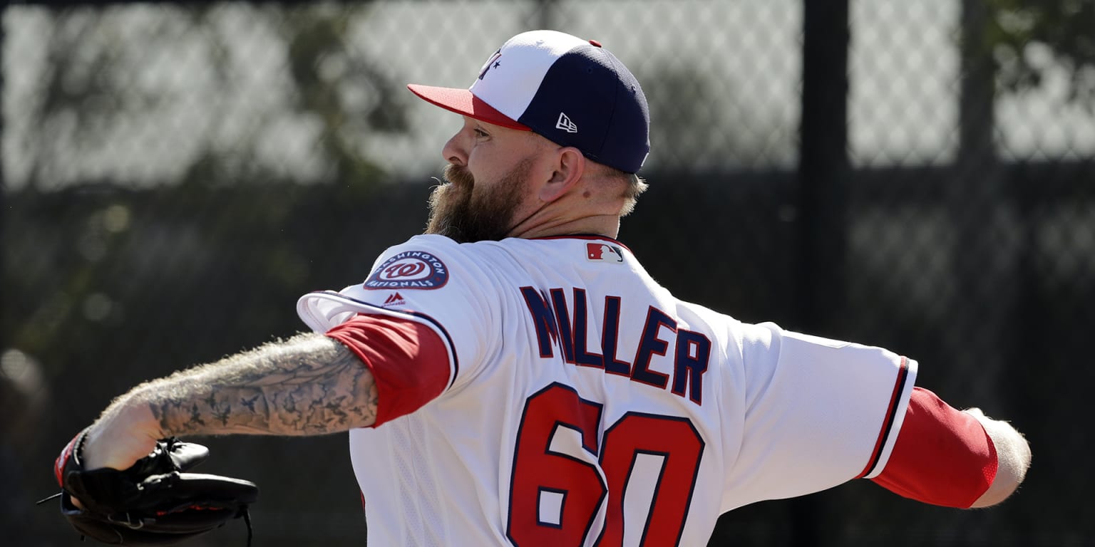 Justin Miller receives treatment to help back pain