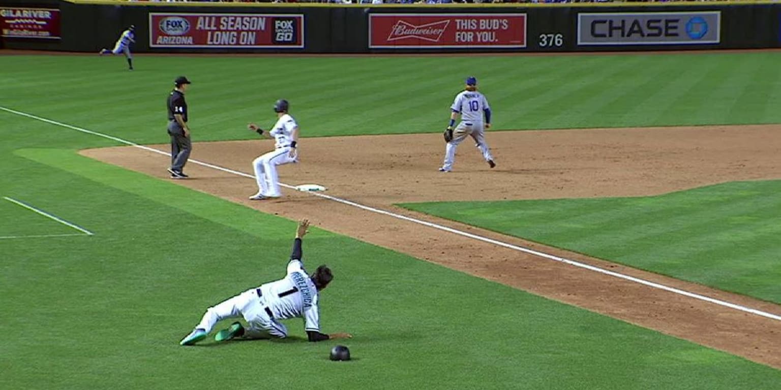 D-backs third-base coach Tony Perezchica tried waving a runner home but ...