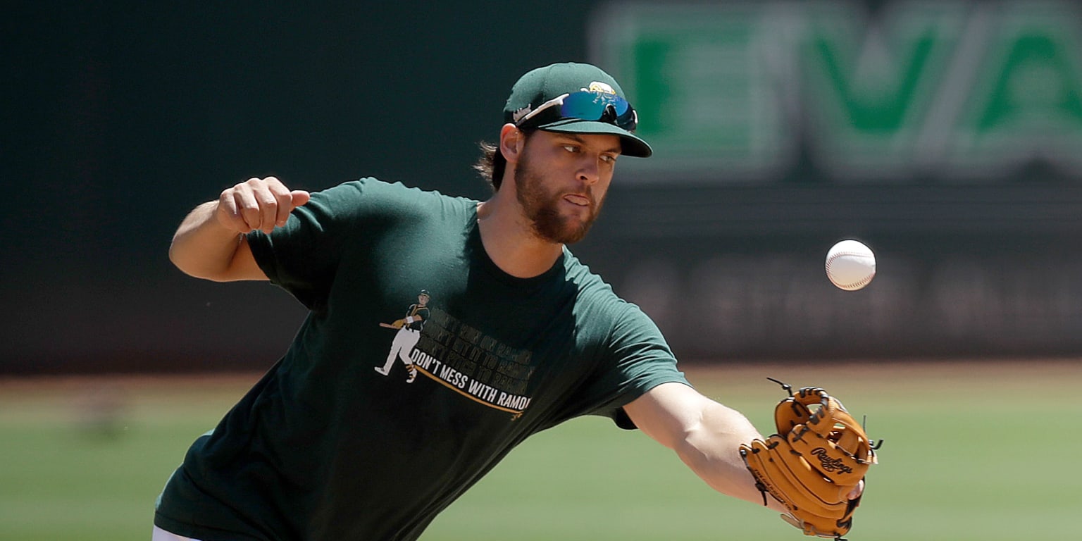 Chad Pinder working on second base at A's camp