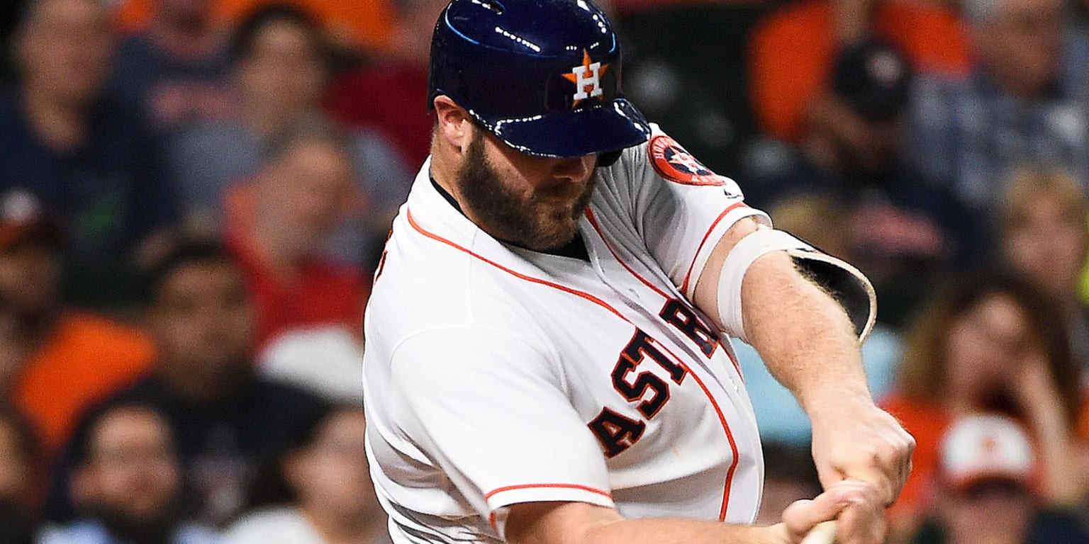 Evan Gattis homers, plays catcher vs. Orioles