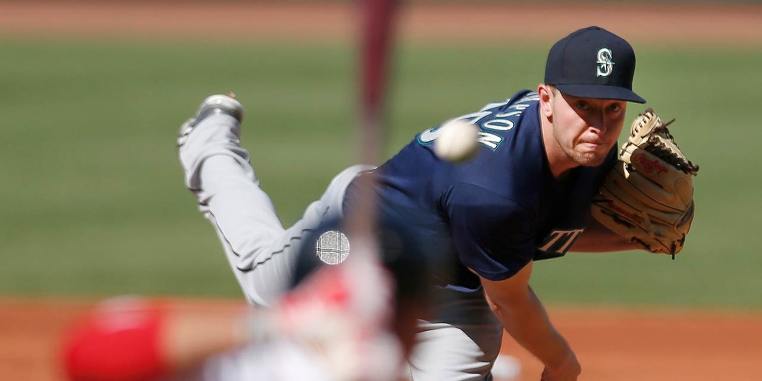 Mariners right-hander Adrian Sampson debuts