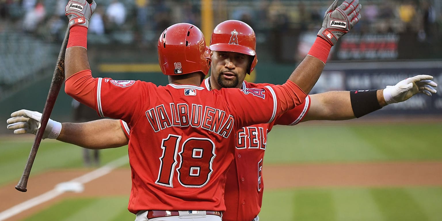 Angels hit 3 homers to defeat A's, even series