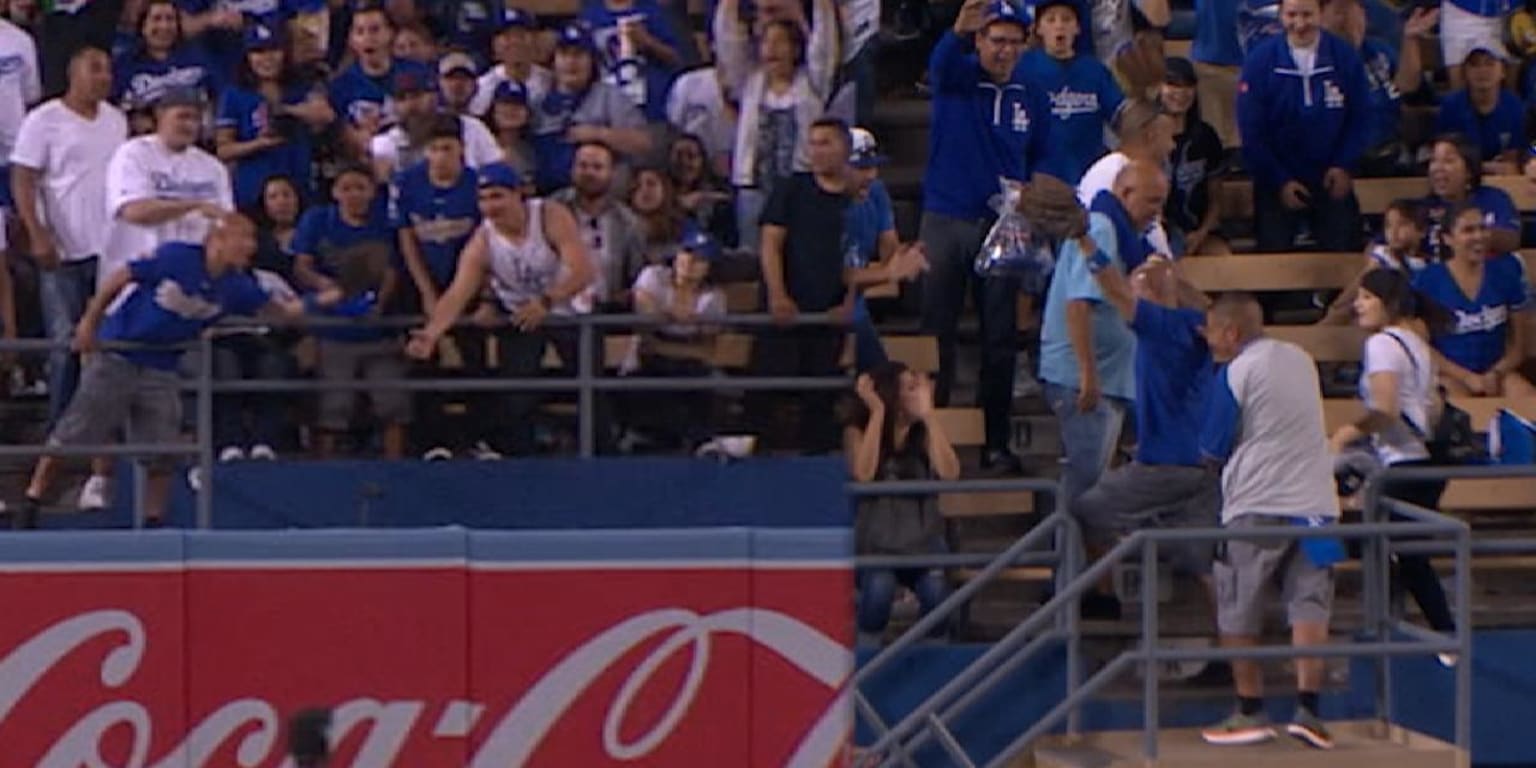 Lightning struck twice for a Dodgers fan who caught two home run balls ...