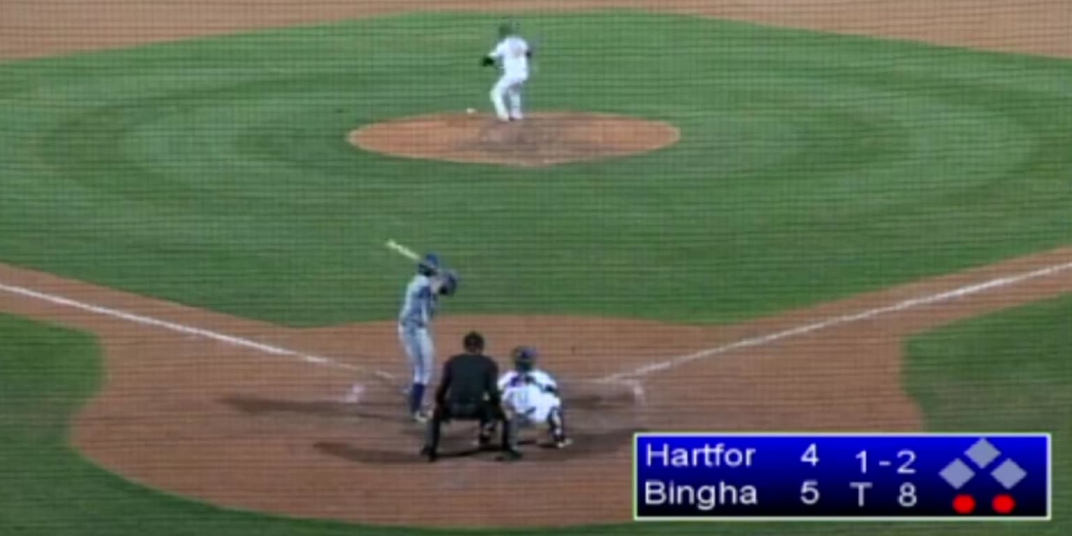Please enjoy this Minor Leaguer striking out on a ball rolling along ...