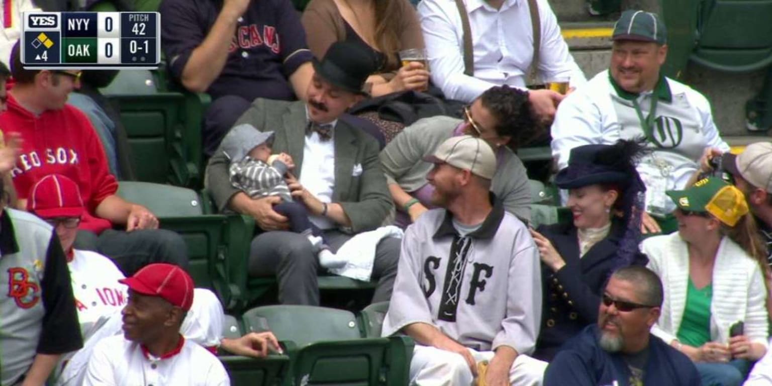 A's fans dress up as old-time base ballers, give souvenir to baby ...