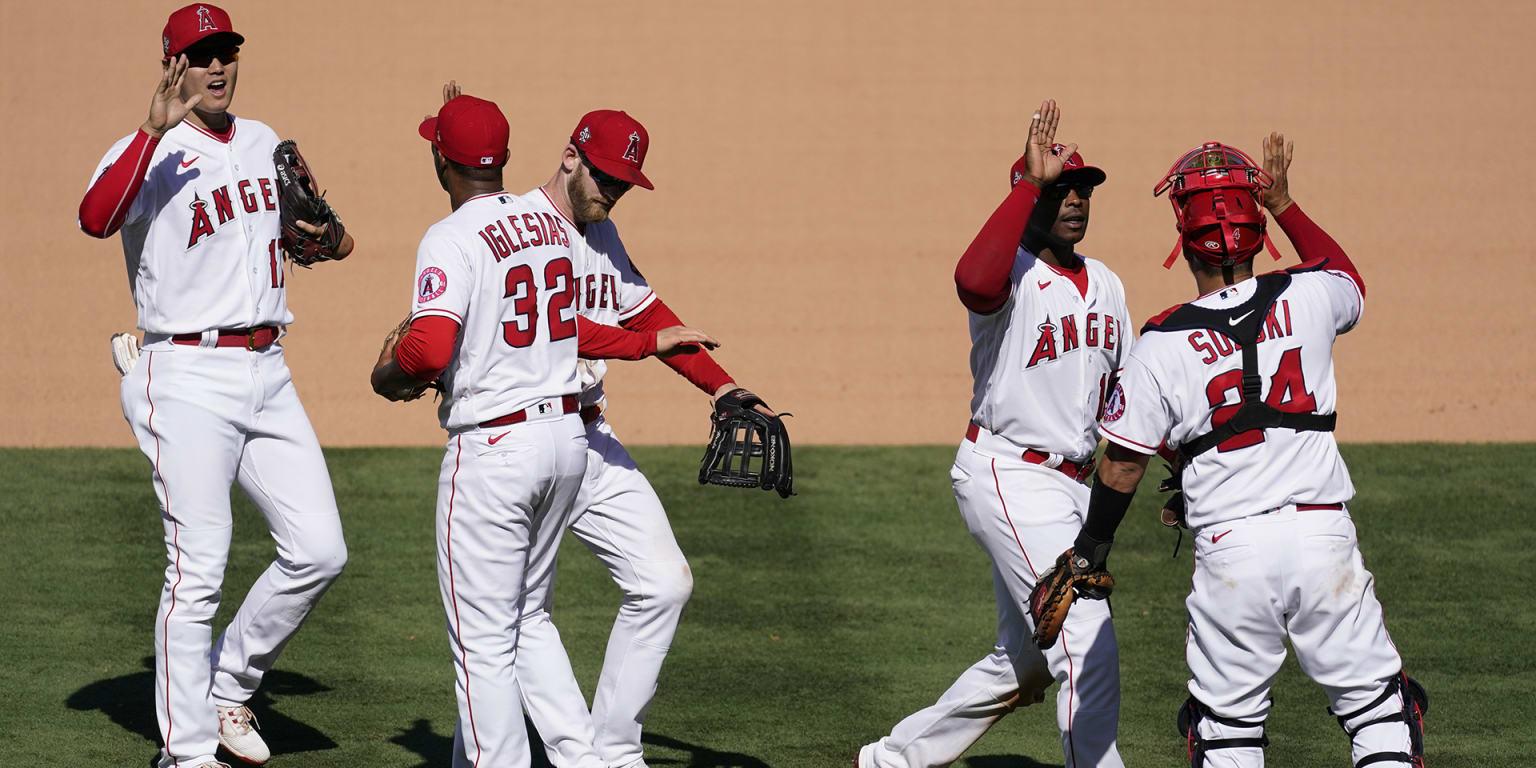 Angels beat A's with late rally, avoid sweep