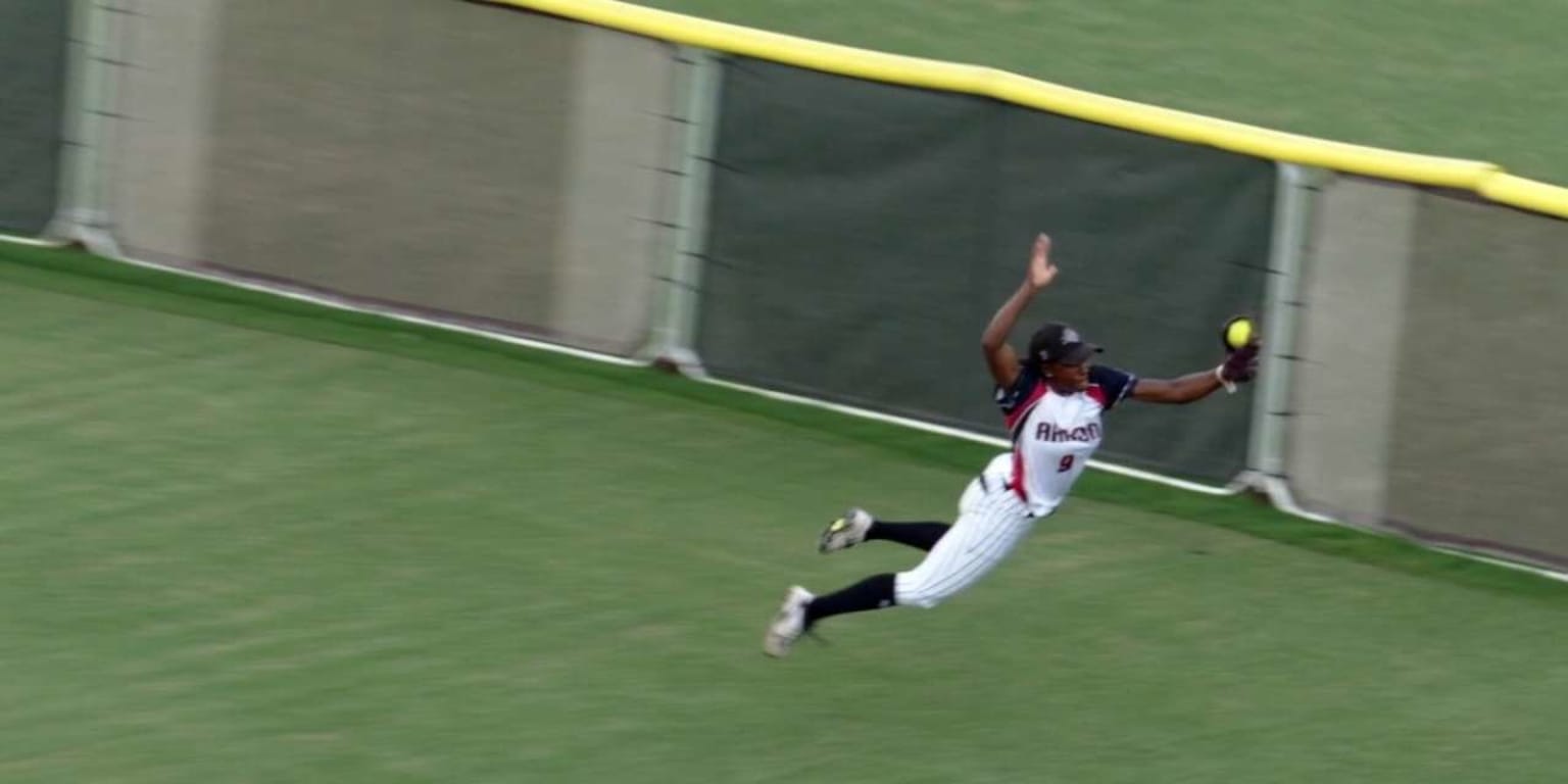 Watch this softball player sacrifice her face to the fence to make an ...