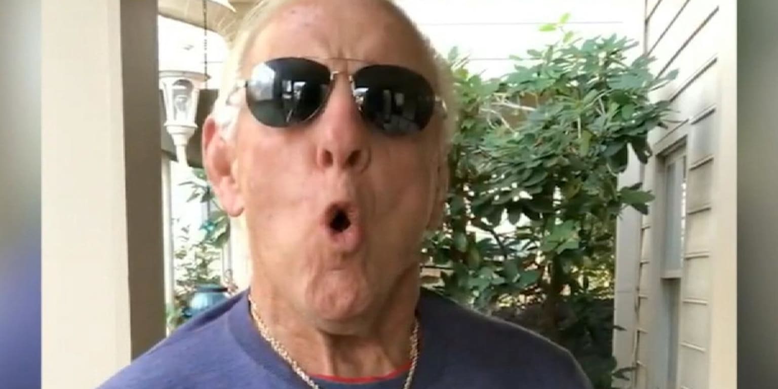 As promised, an excited Ric Flair shouted 'Play Ball!' for the Astros ...