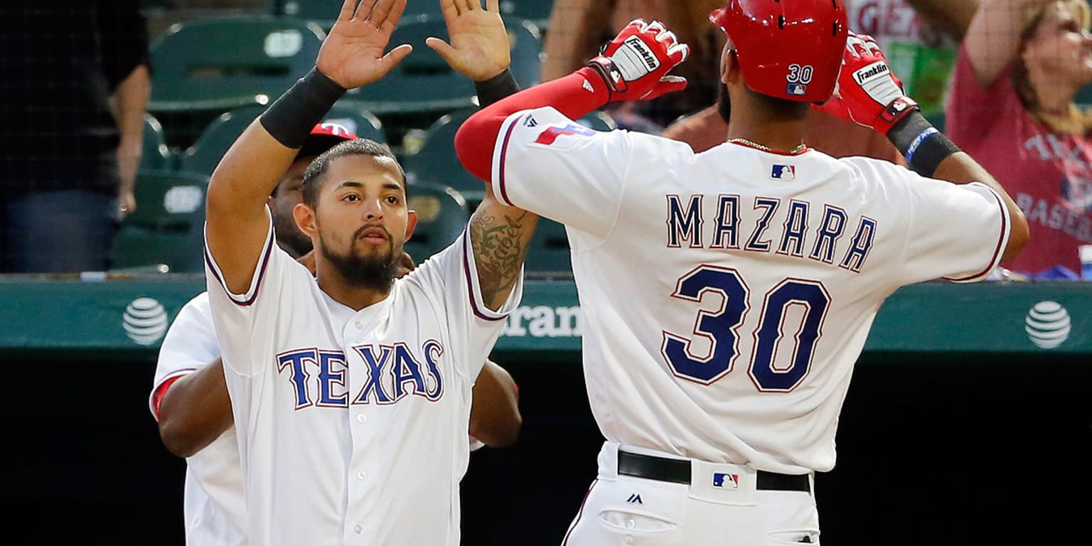 Texas raps 13 hits to end losing streak