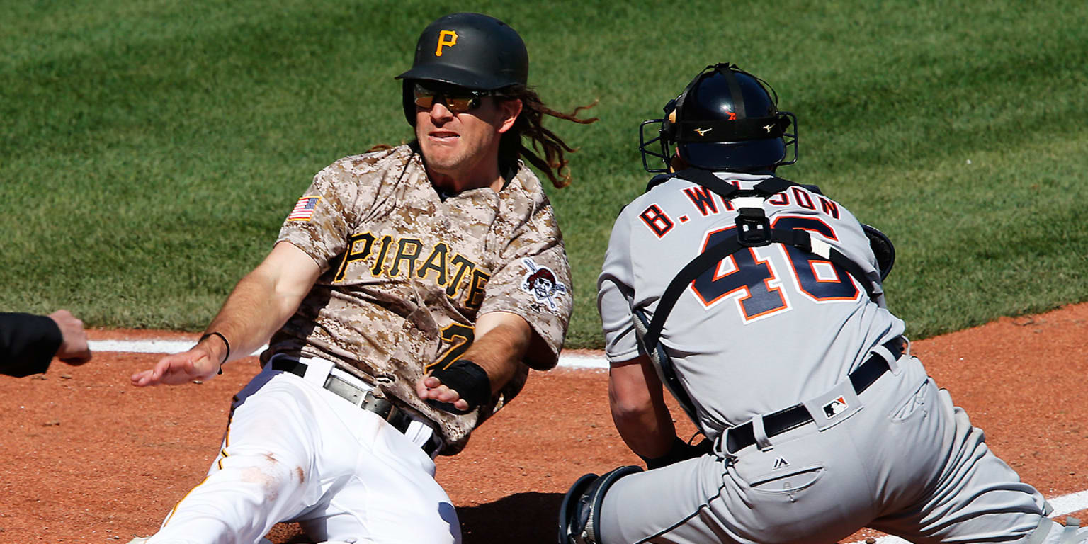Tigers execute relay to get out at home plate