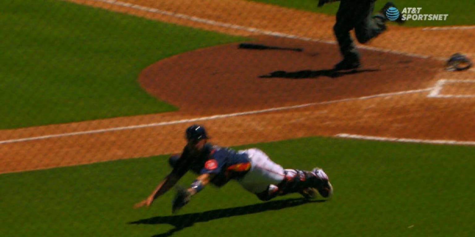 Max Stassi went full extension with a stellar catch off a bunt popup ...