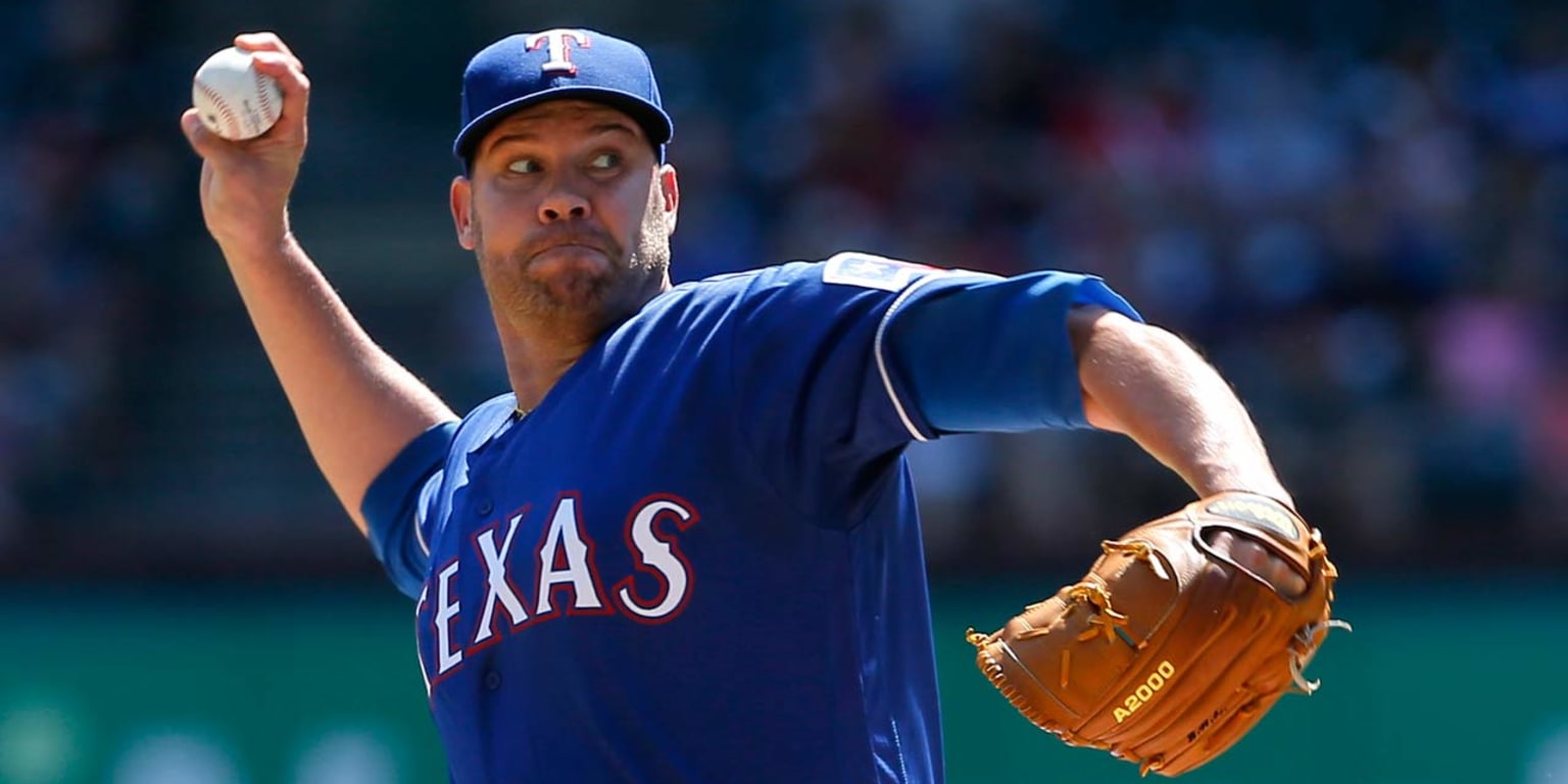 Rangers' Colby Lewis walks five in loss to A's