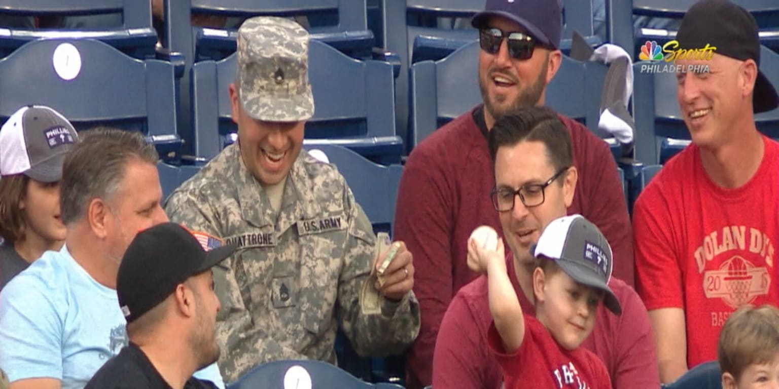 A young fan tried to get in on the action by throwing a ball onto the ...