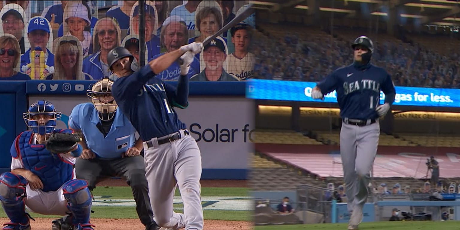 Evan White swinging hot bat