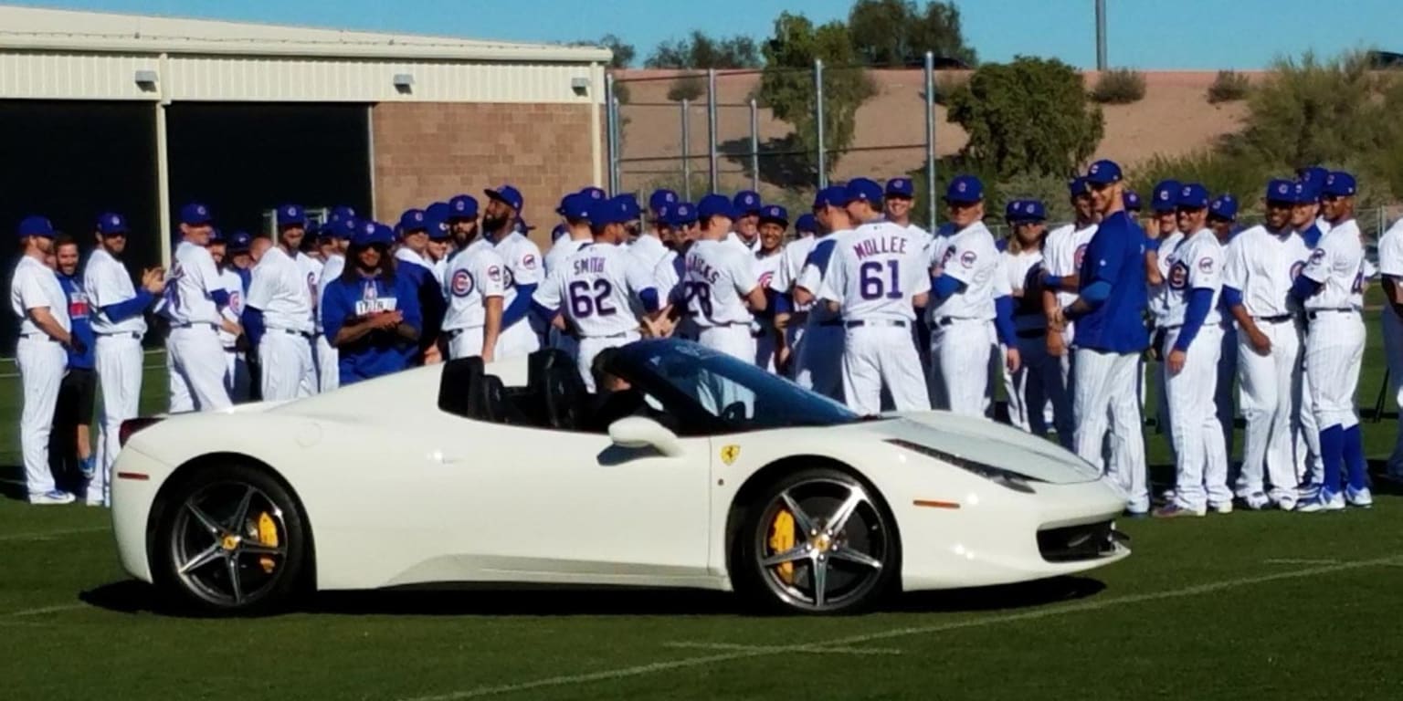 Tim Buss arrives at Cubs practice in Ferrari
