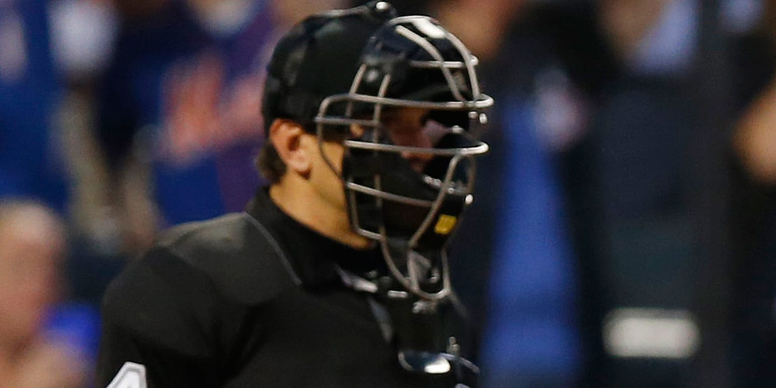 Umpire Chad Fairchild struck by foul, exits