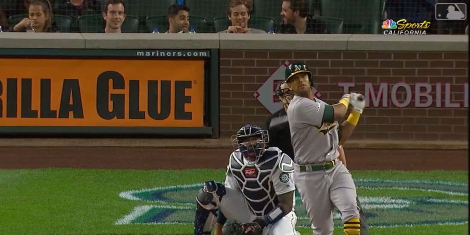 Athletics slug five homers, but lose in extras