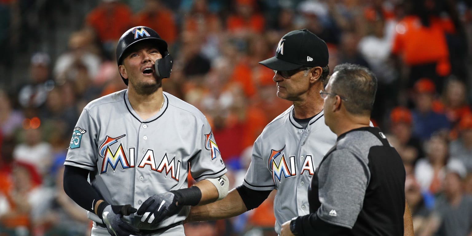 Miguel Rojas exits after being hit by pitch