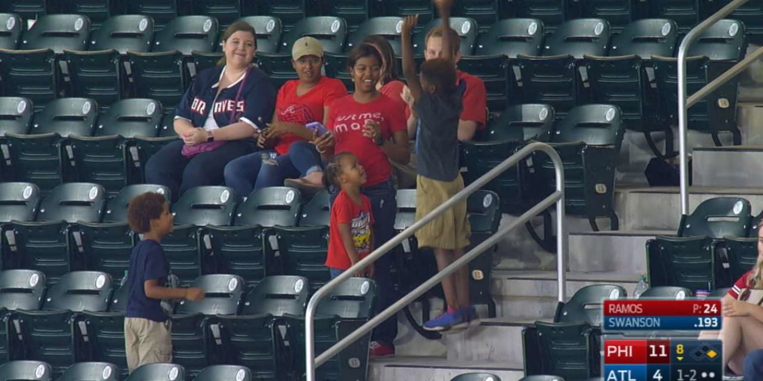 A tale of two fans: one leaping for joy, the other crying in despair ...