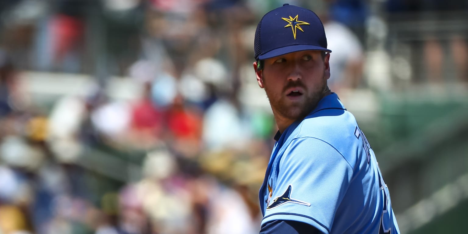 Tyler Zombro pitches in Spring Training game