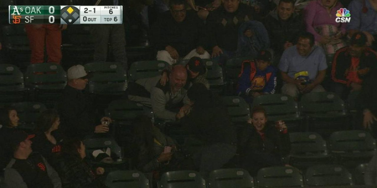 Two Giants fans struggled over a foul ball before reaching a ...