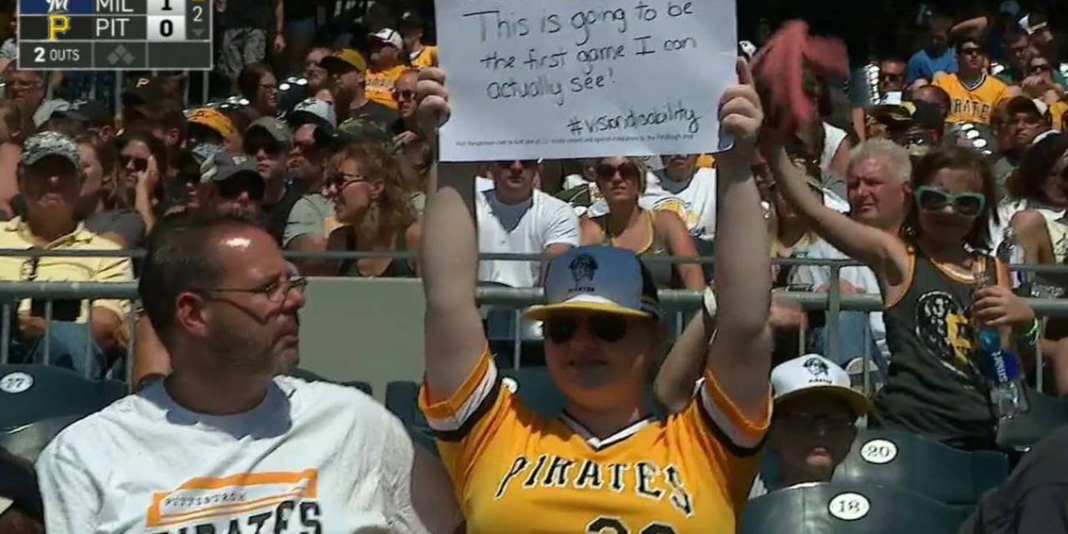 A Pirates fan brought a sign announcing she was seeing her first game ...