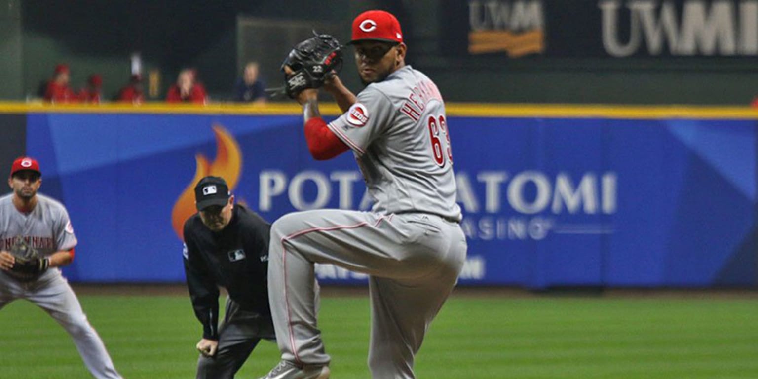 Reds' Ariel Hernandez brings heat in debut