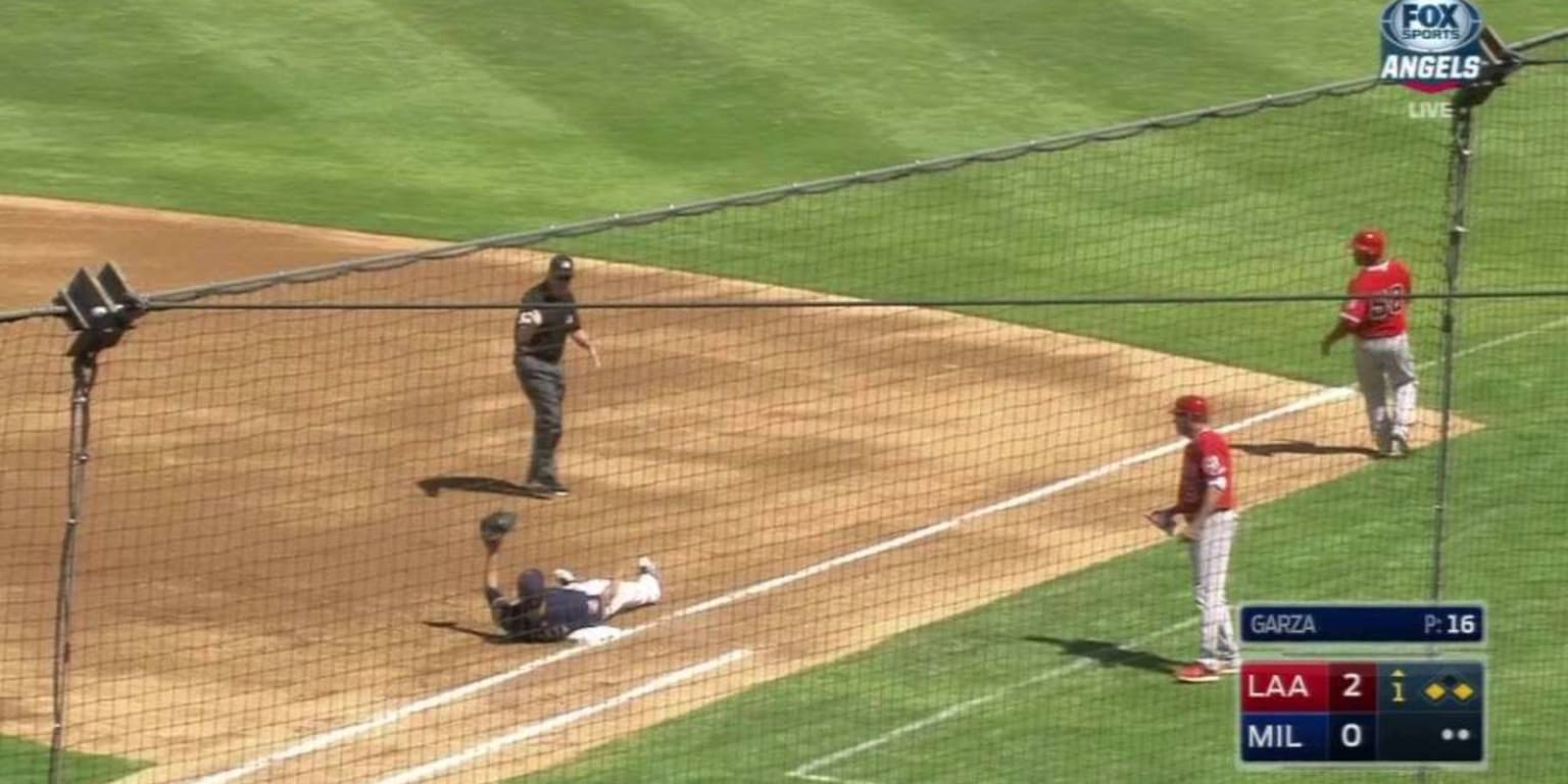 Brewers' Matt Garza tags first base with his back | MLB.com