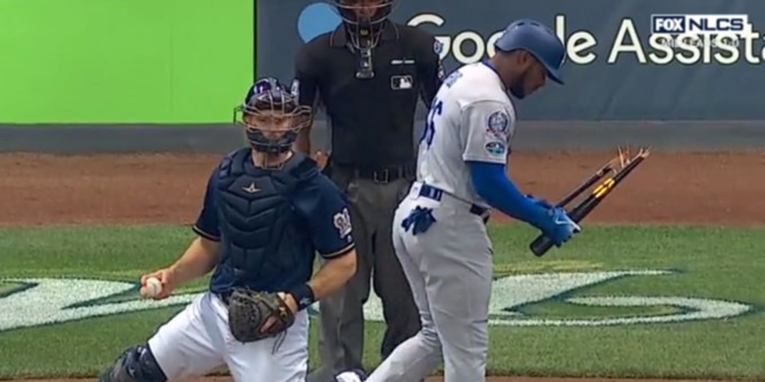 Yasiel Puig snapped his bat over his knee after striking out with the ...