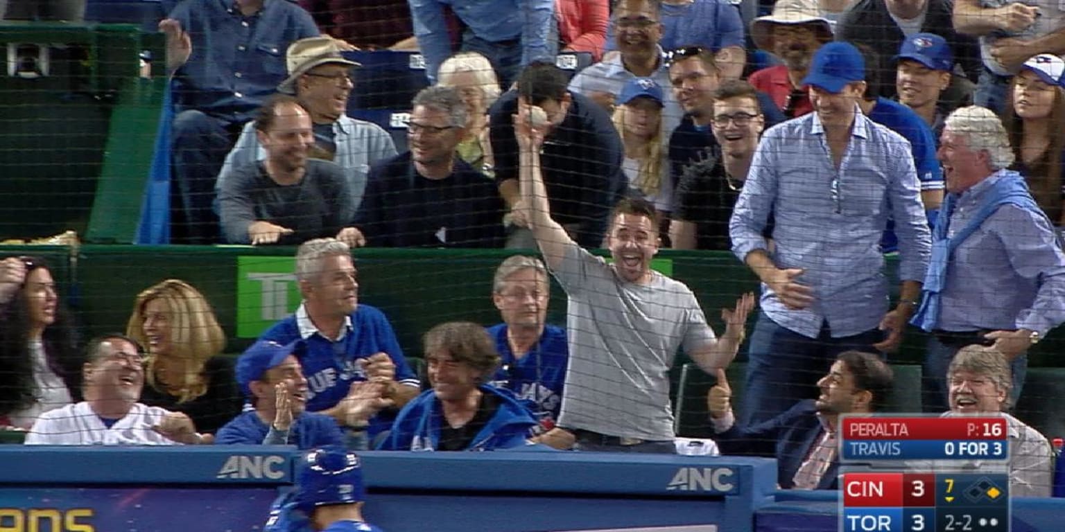 This pitch was so wild it somehow ended up in the lap of a fan behind ...