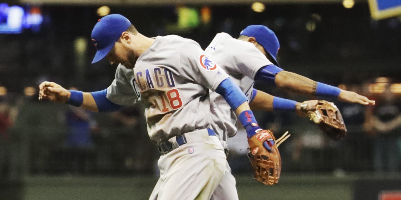 Cubs restore order with 13-inning win