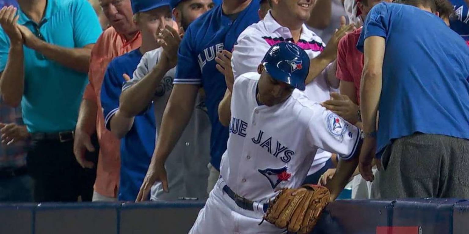 A Blue Jays ballboy was willing to leap into the stands to make a play ...
