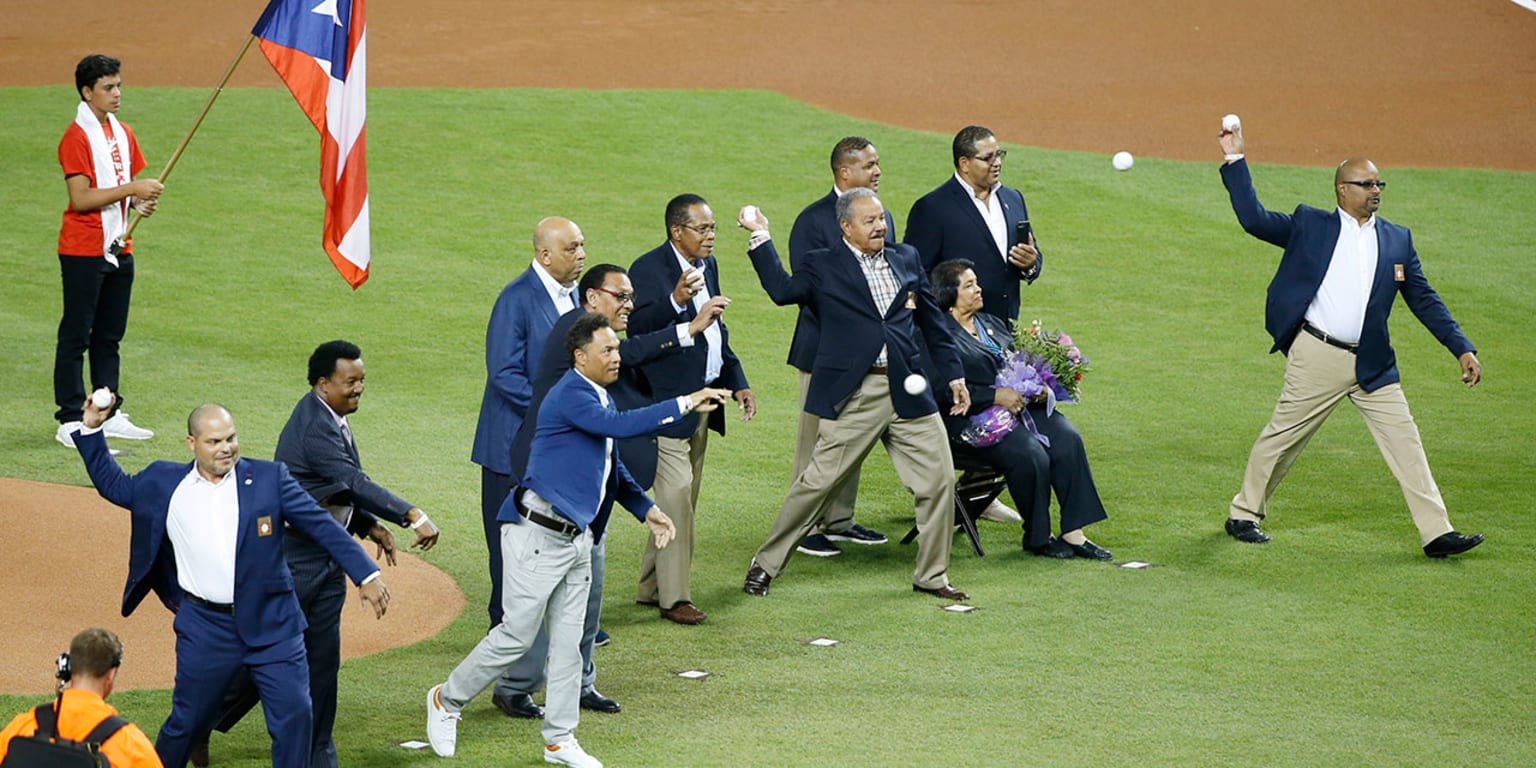 Latin players throw out ASG first pitch