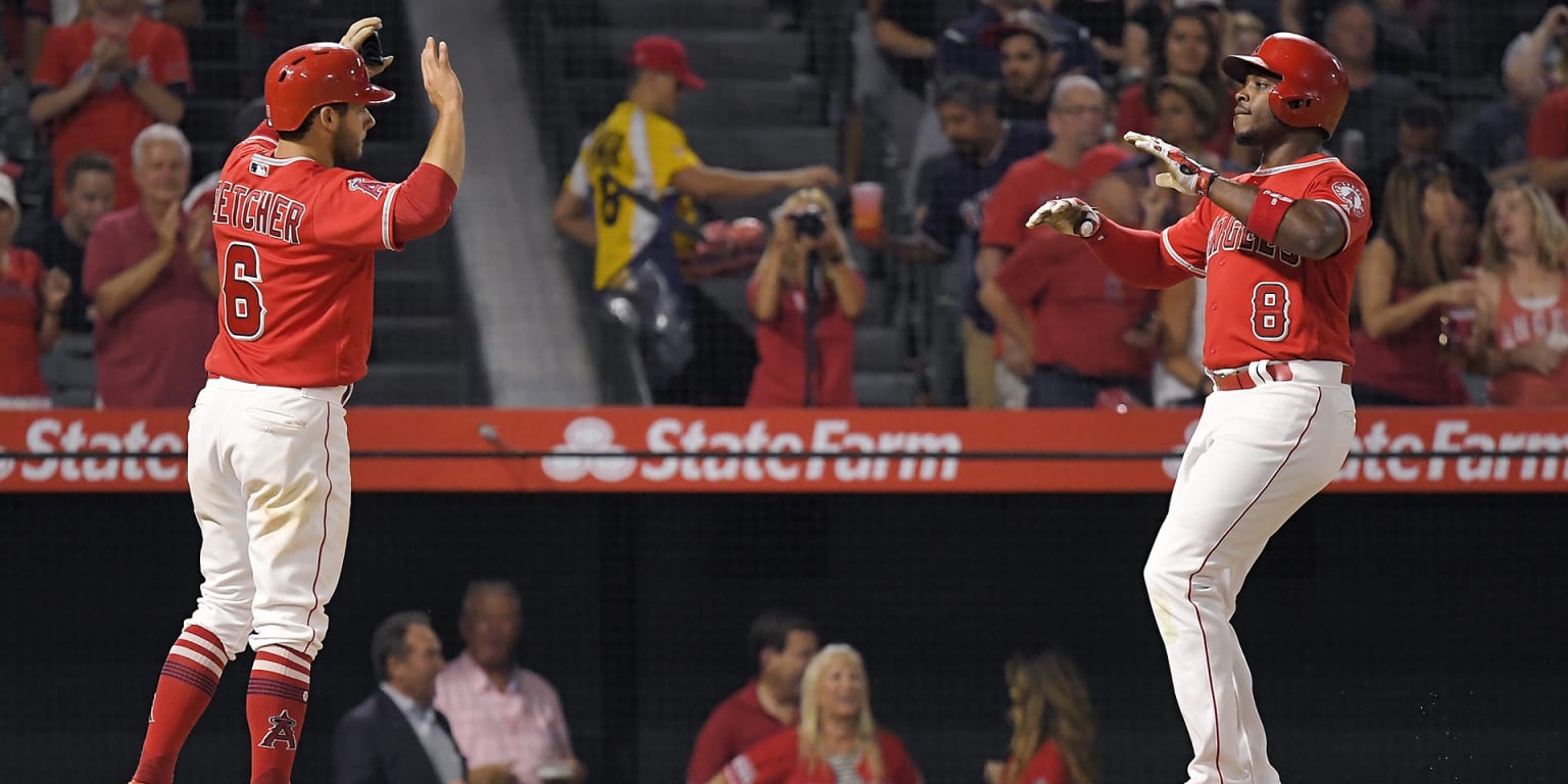 Angels rally past Athletics in series opener