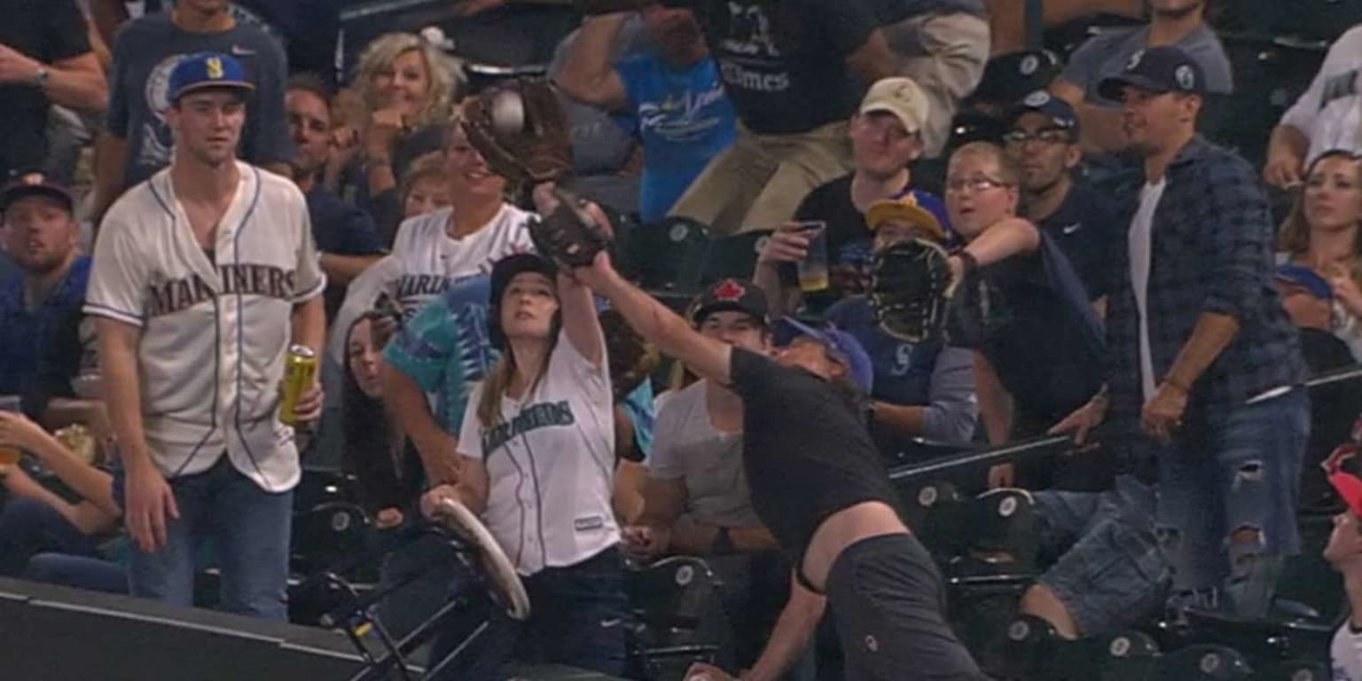 Watch this Mariners ballgirl reel in a foul ball beyond the Safeco ...