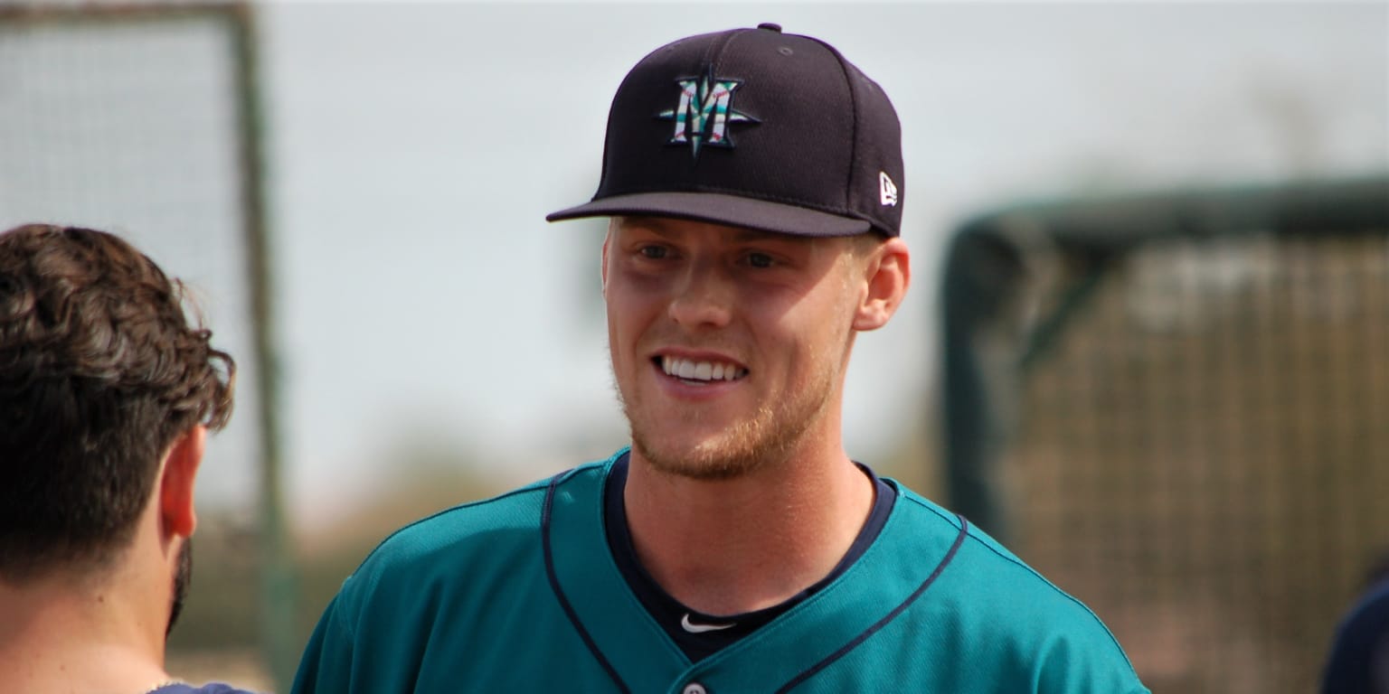 Sam Carlson throws batting practice