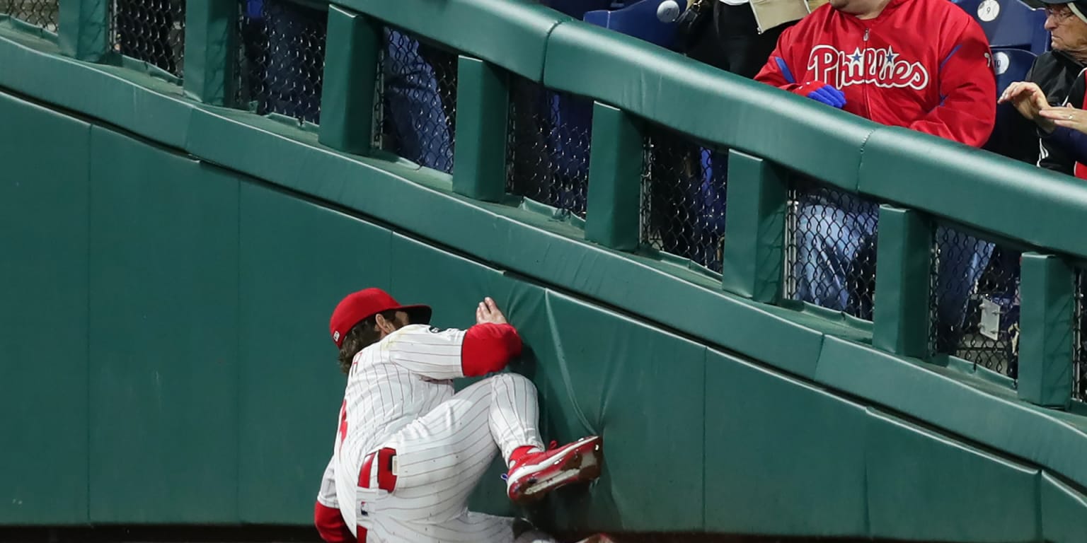 Bryce Harper knee sore after sliding into wall